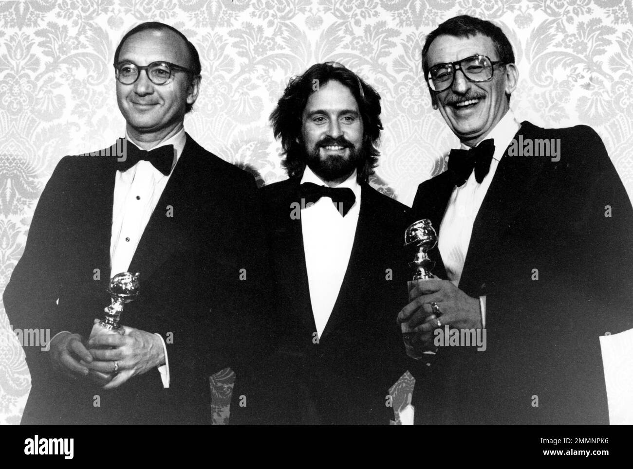 FILE- In this Jan. 29, 1978, file photo Neil Simon, Michael Douglas and Herbert Ross pose after ...