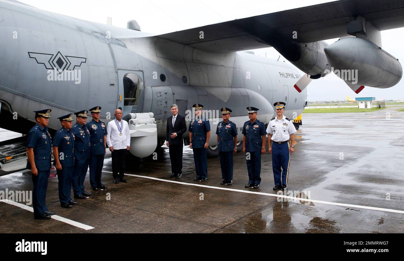 Philippine Defense Chief Delfin Lorenzana, fifth from left, U.S ...