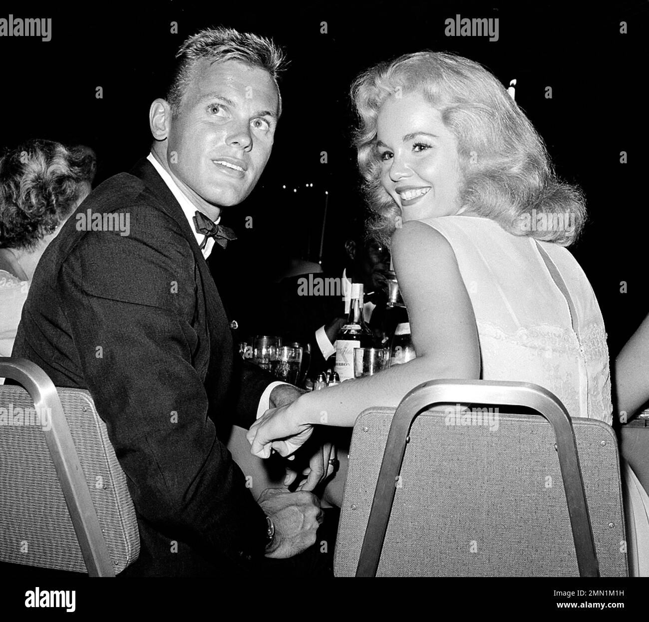 FILE - This July 27, 1959 file photo shows actor Tab Hunter, left, with ...