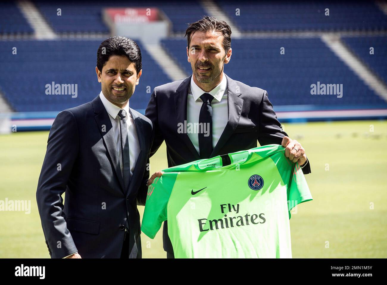 PSG's new signing goalkeeper Gianluigi Buffon, right, poses with Paris ...