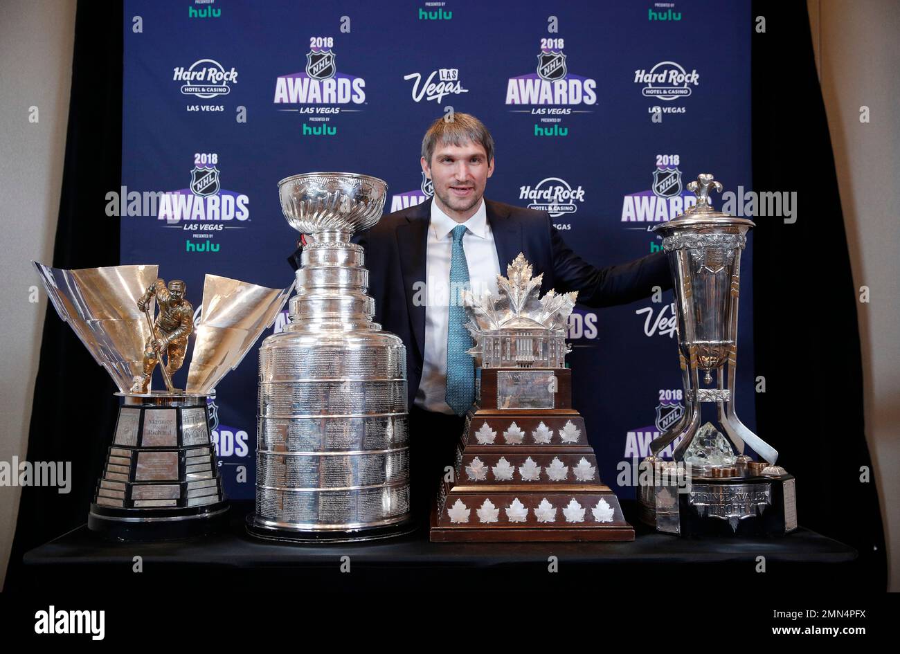 Washington Capitals' Alex Ovechkin poses with the Maurice Richard ...