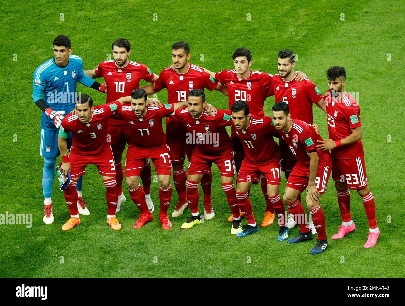 Iran's starting players pose for a team photo at the beginning of the ...