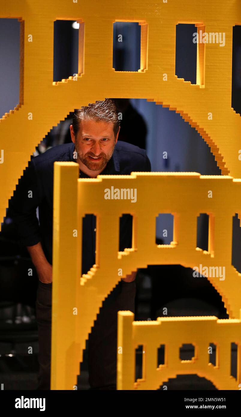 Lego artist Nathan Sawaya poses beside his Pittsburgh inspired Lego ...