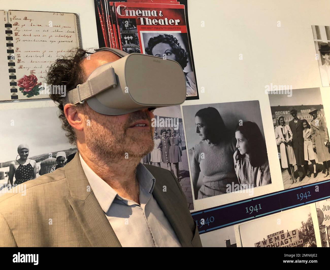 Ronald Leopold, executive director of the Anne Frank House, views a new virtual reality ...