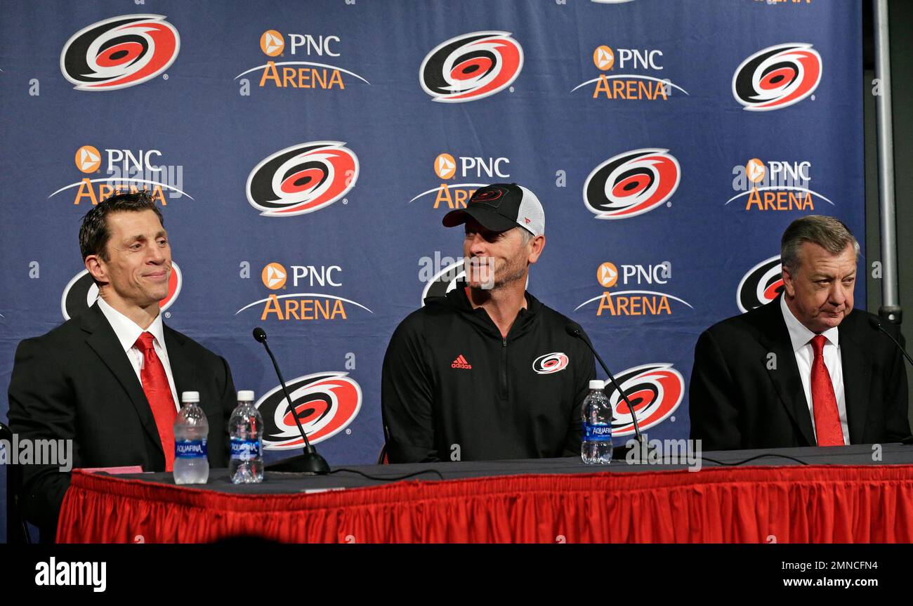 Carolina Hurricanes new head coach Rod Brind'Amour, left, is joined by ...