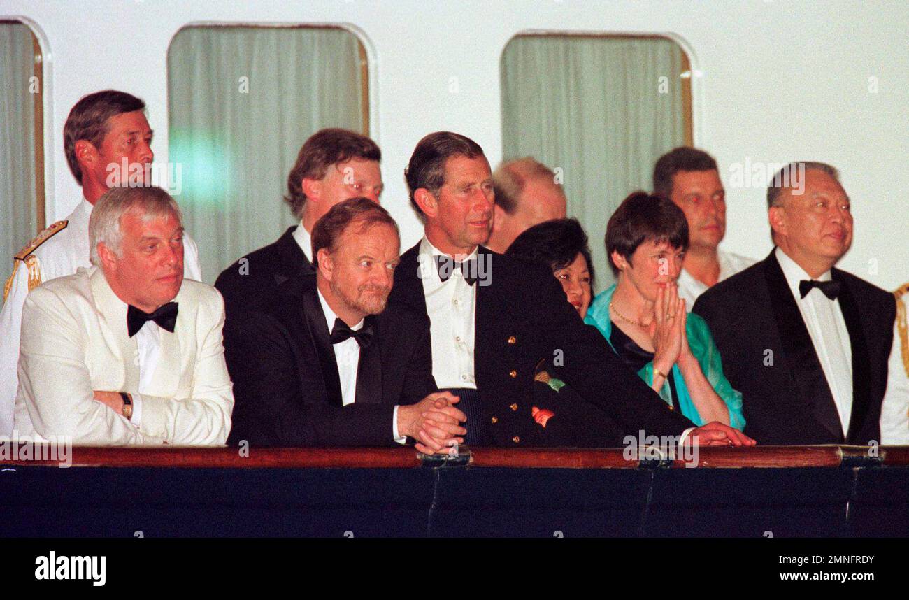 FILE - In this Saturday, June 28, 1997 file photo, Gov. Chris Patten, left, along with British ...