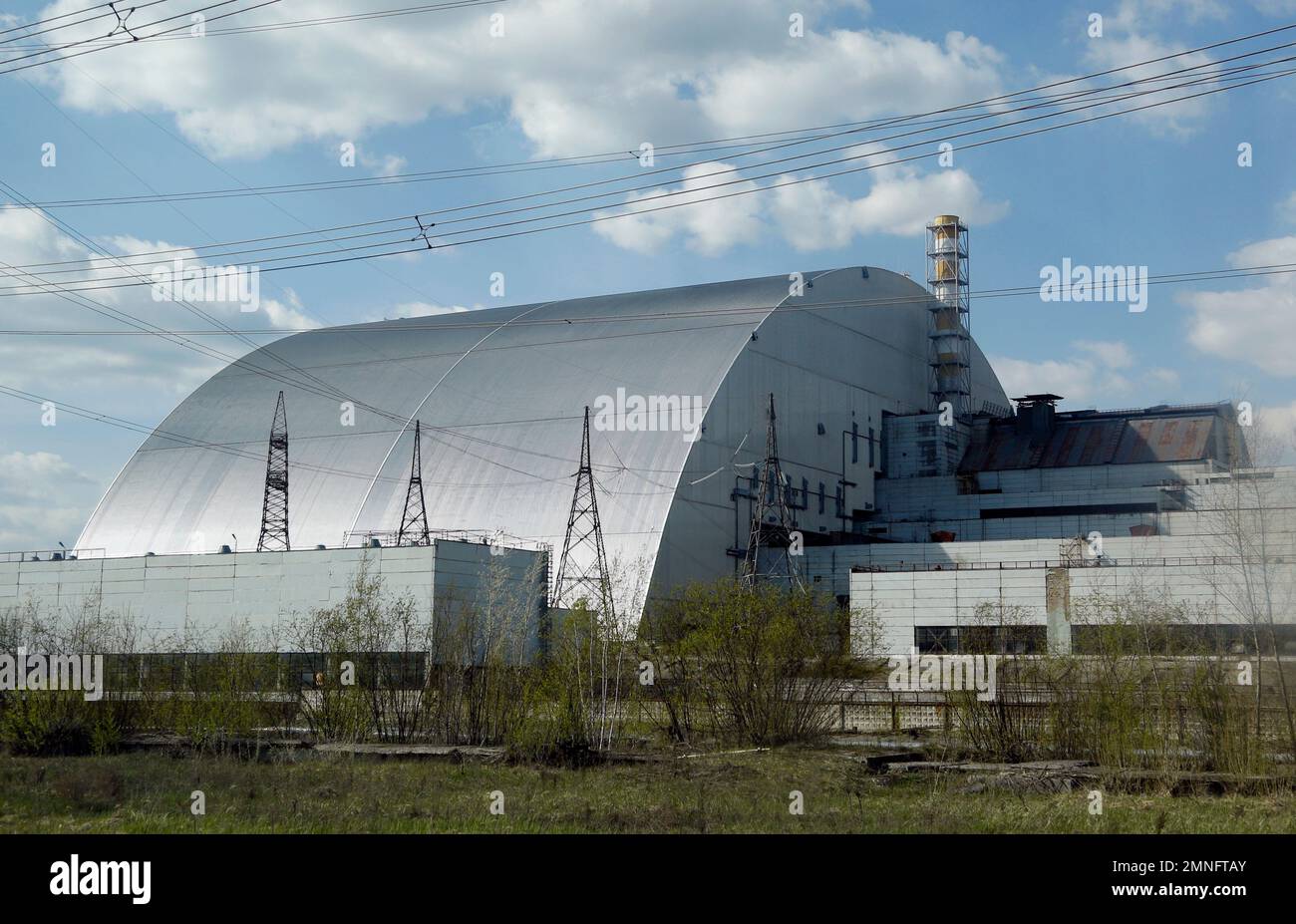 A new shelter is installed over the exploded reactor at the Chernobyl ...
