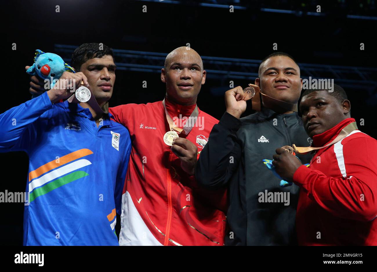 From left to right, silver medalist Satish Kumar of India, gold ...