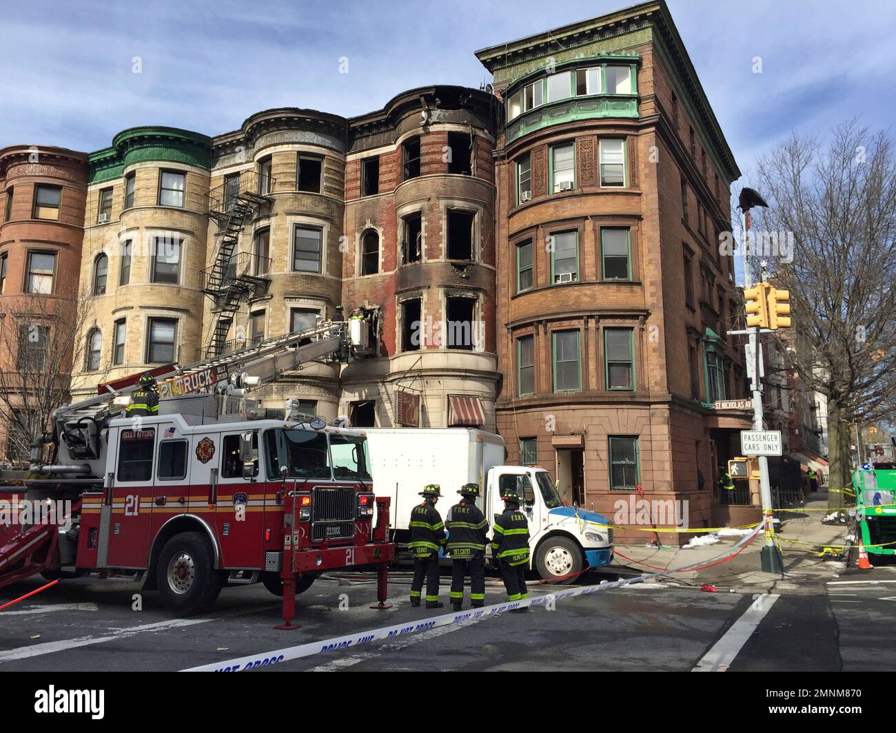 Firefighters work at the scene of a fire Friday, March 23, 2018 that ...