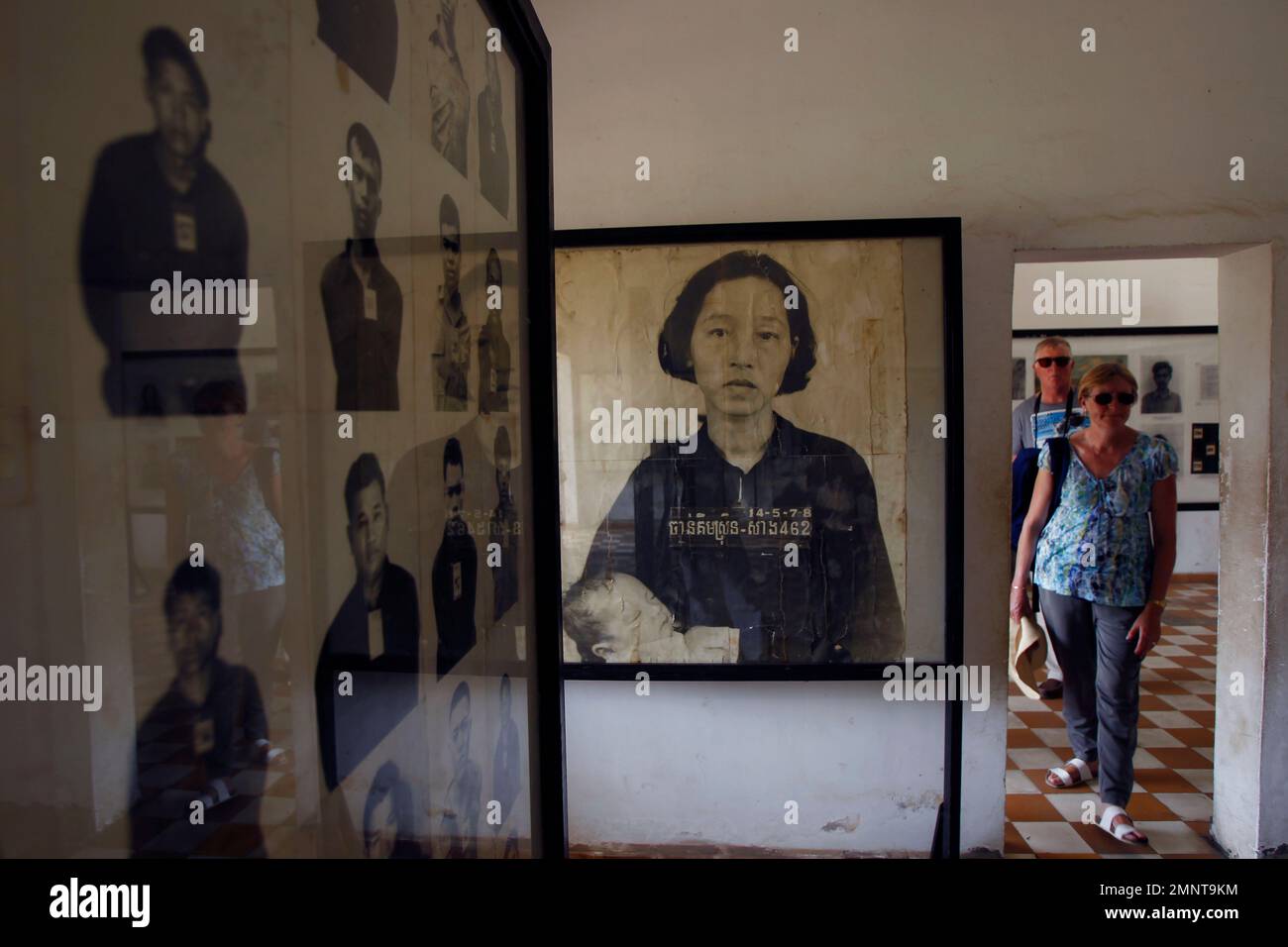 FILE - In this April 9, 2015, file photo, tourists view portraits of ...