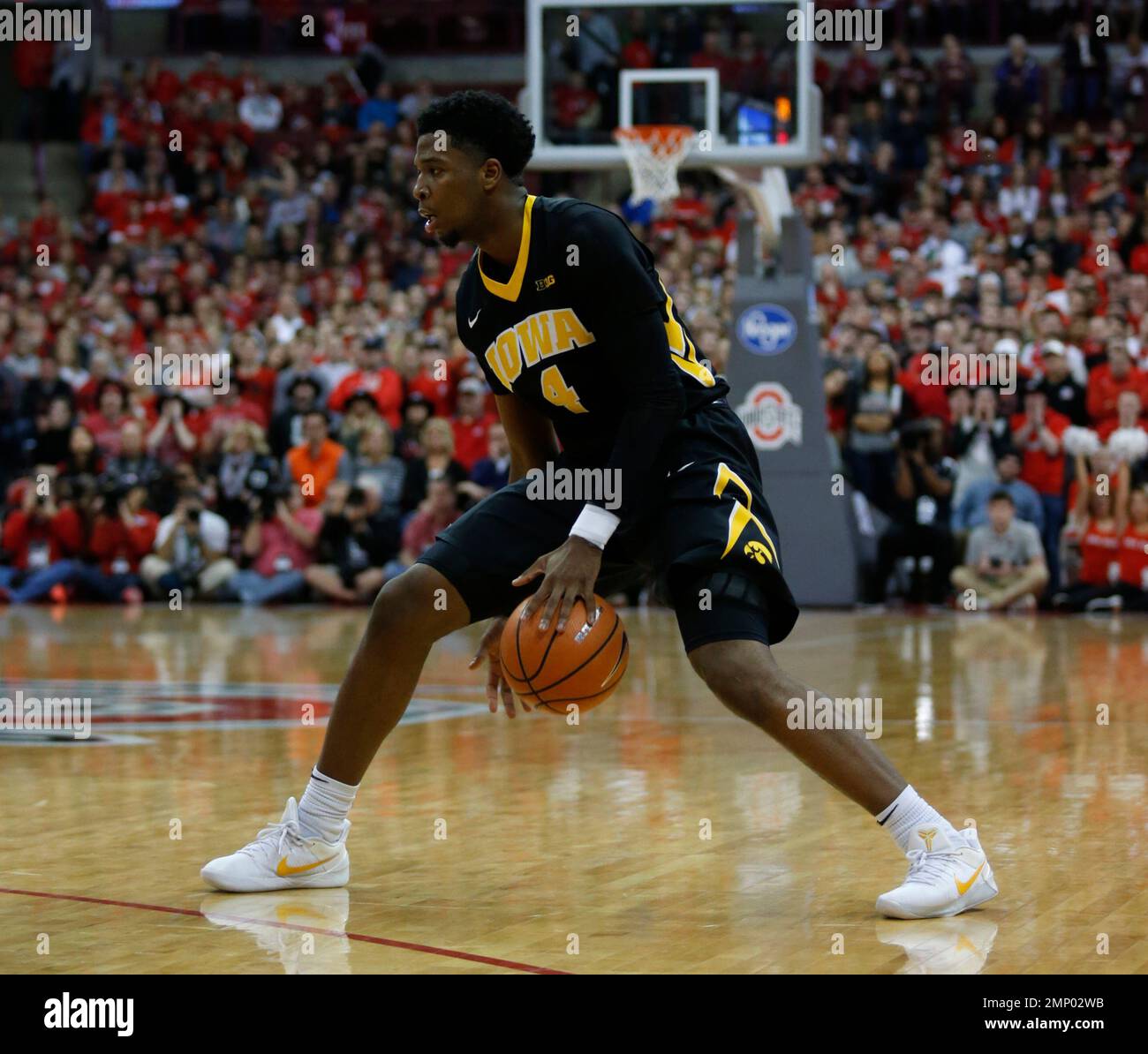 Iowa guard Isaiah Moss drives against Ohio State during an NCAA college ...