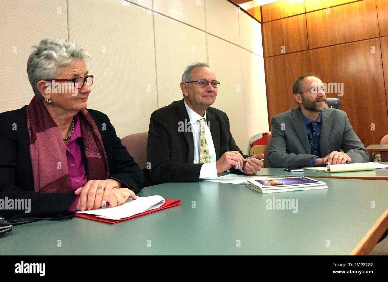 Former Santa Fe Mayor David Coss, middle, announces a lawsuit on Monday ...
