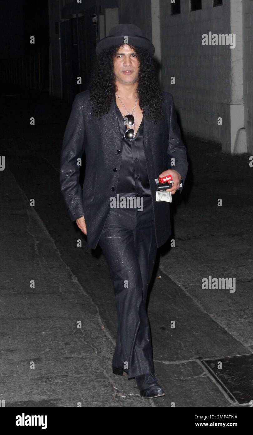 Le guitariste Velvet Revolver Slash et son épouse Perla Ferrar ...
