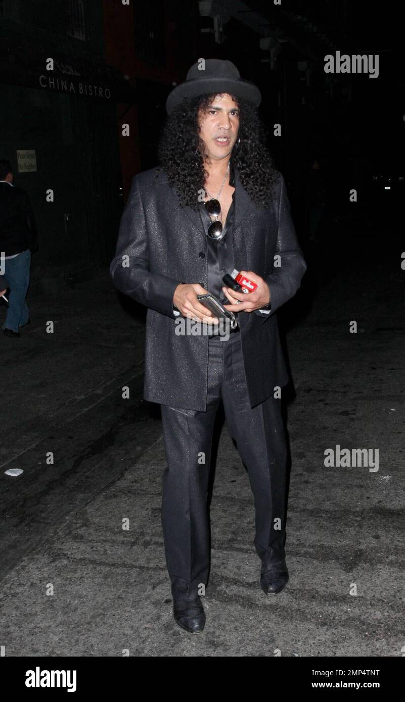 Le guitariste Velvet Revolver Slash et son épouse Perla Ferrar ...