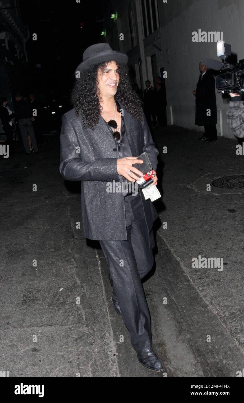 Le guitariste Velvet Revolver Slash et son épouse Perla Ferrar ...
