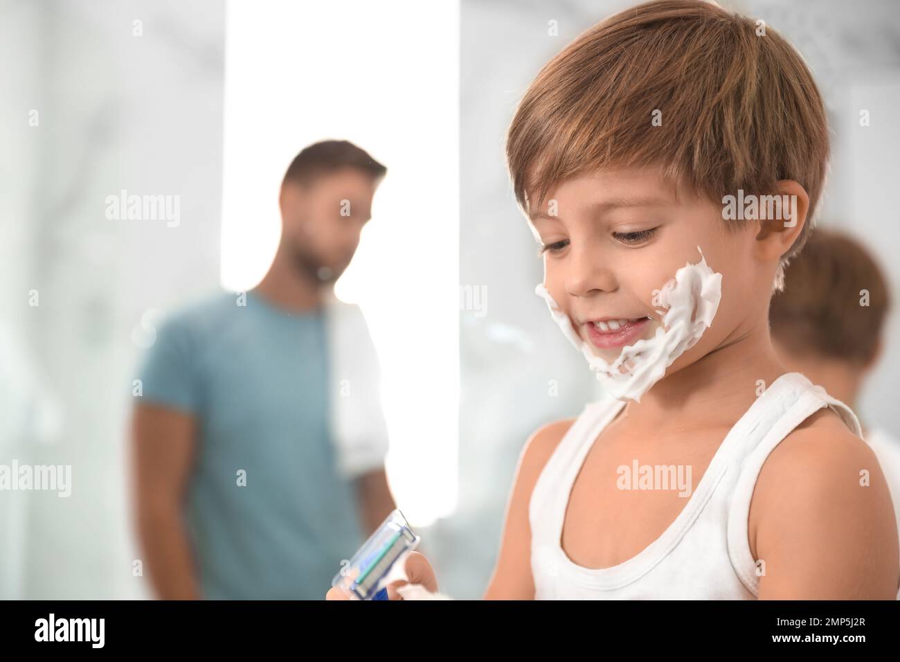 Homme imberbe et garçon Banque de photographies et d’images à haute ...