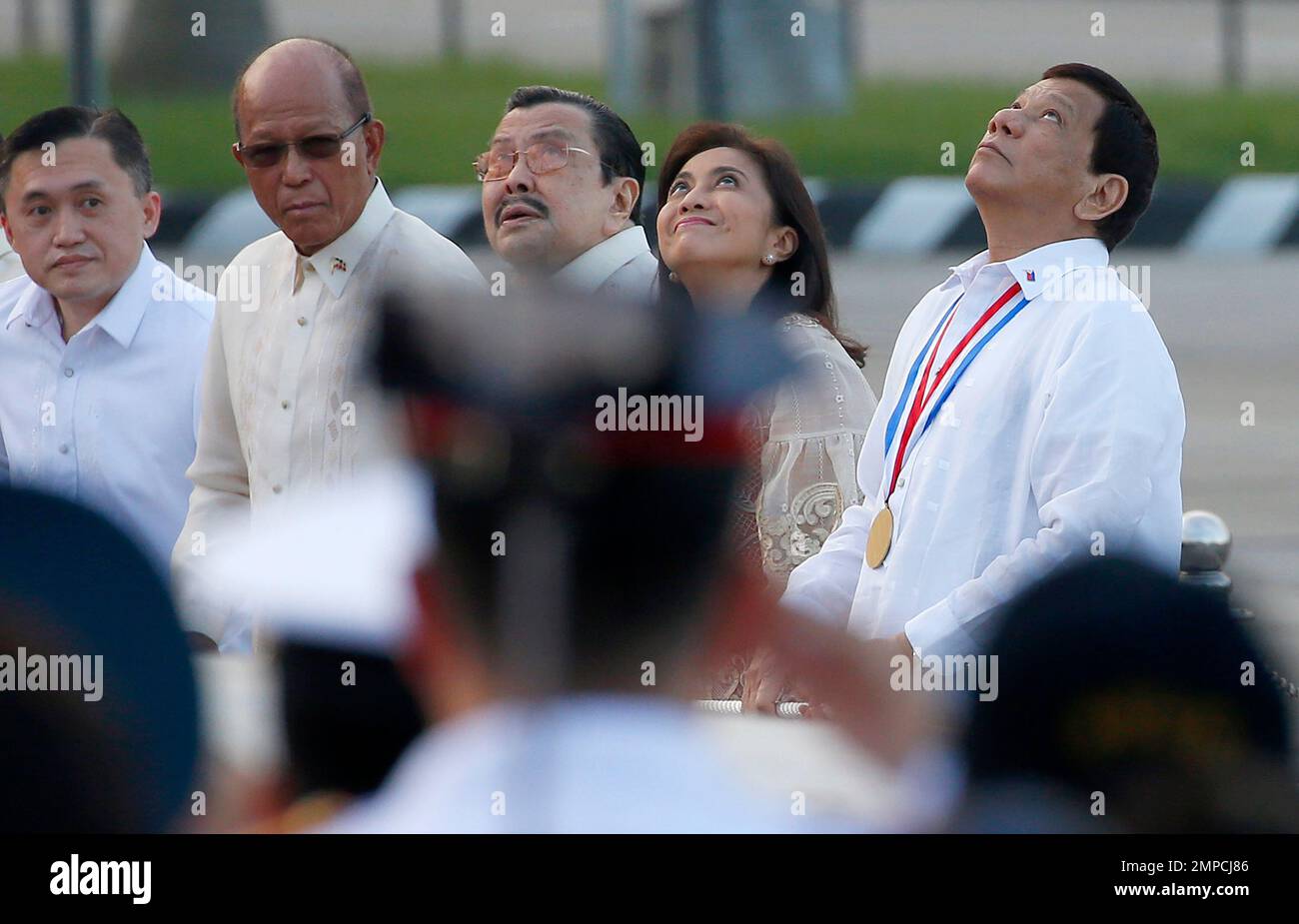 Philippine President Rodrigo Duterte, right, along with Vice-president ...