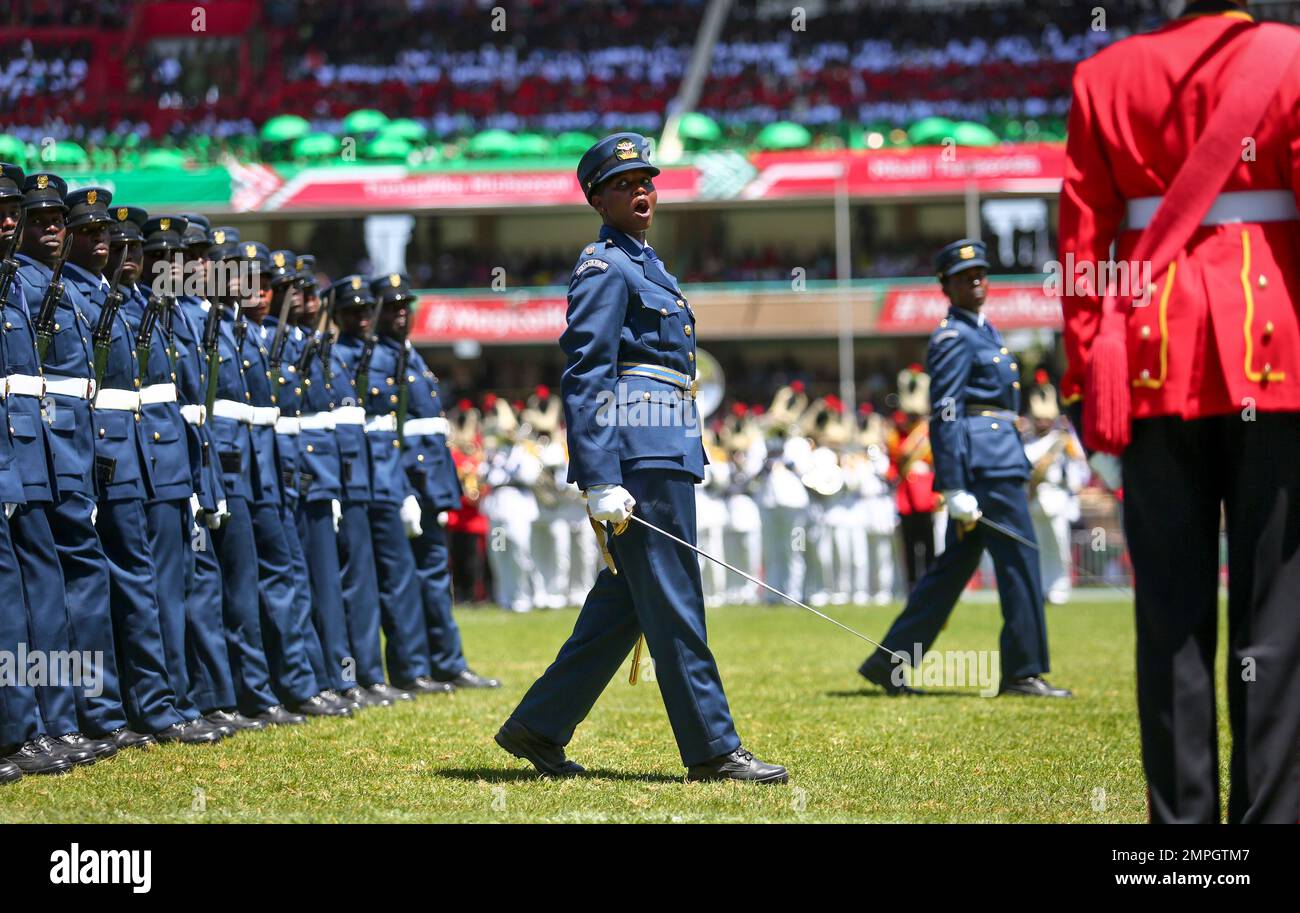 A member of Kenya's Air Force calls out during a military parade at a ...