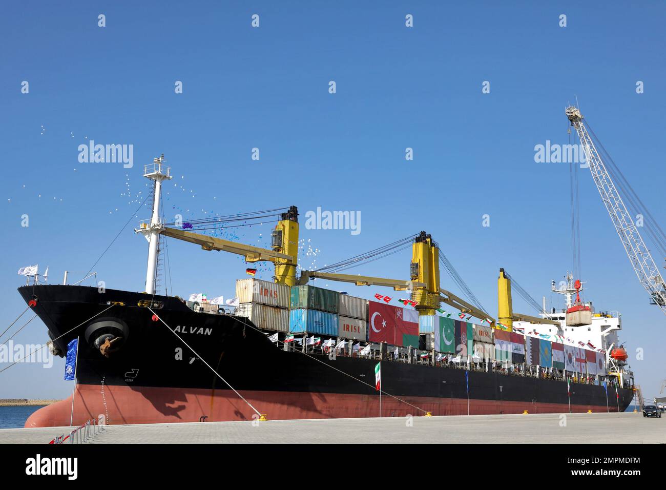 A cargo ship is docked during the inauguration ceremony of the newly ...
