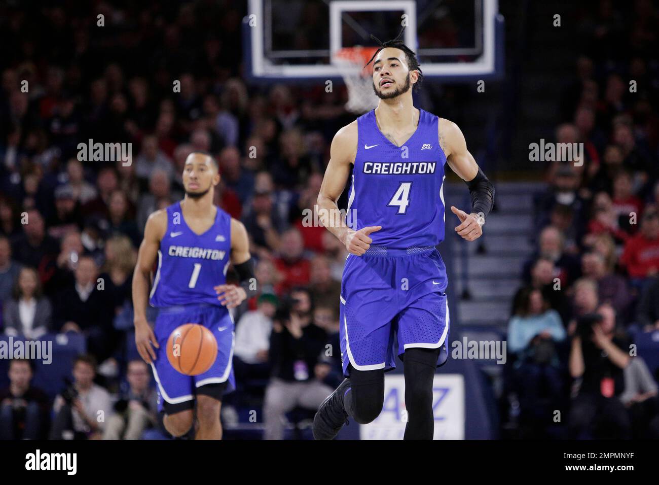 Creighton guard Ronnie Harrell Jr. (4) runs on the court during the ...