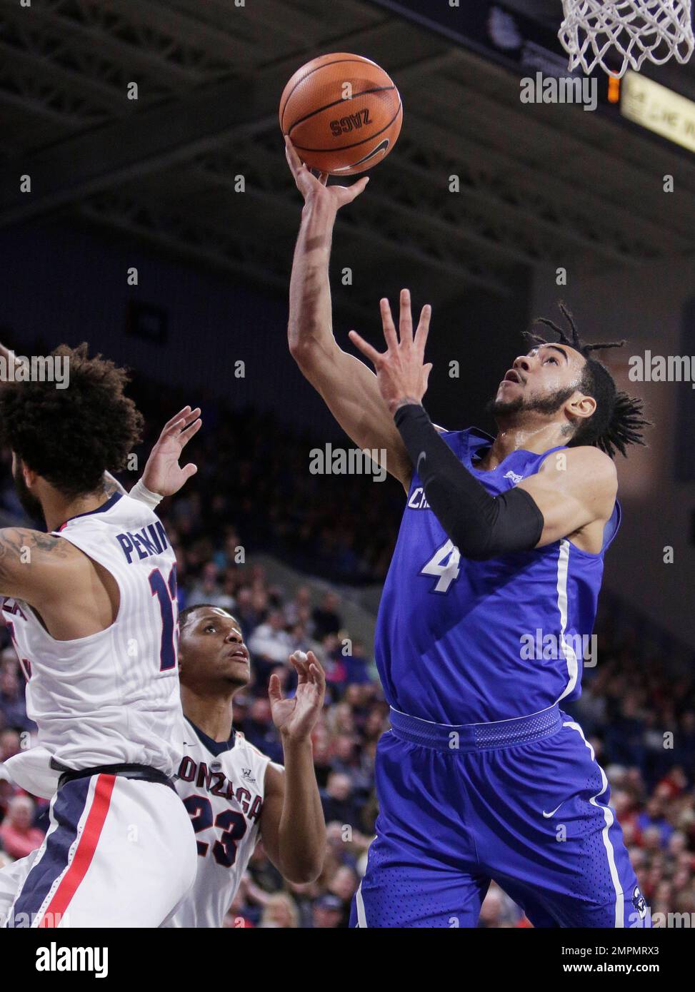 Creighton guard Ronnie Harrell Jr. (4) shoots against Gonzaga guards ...
