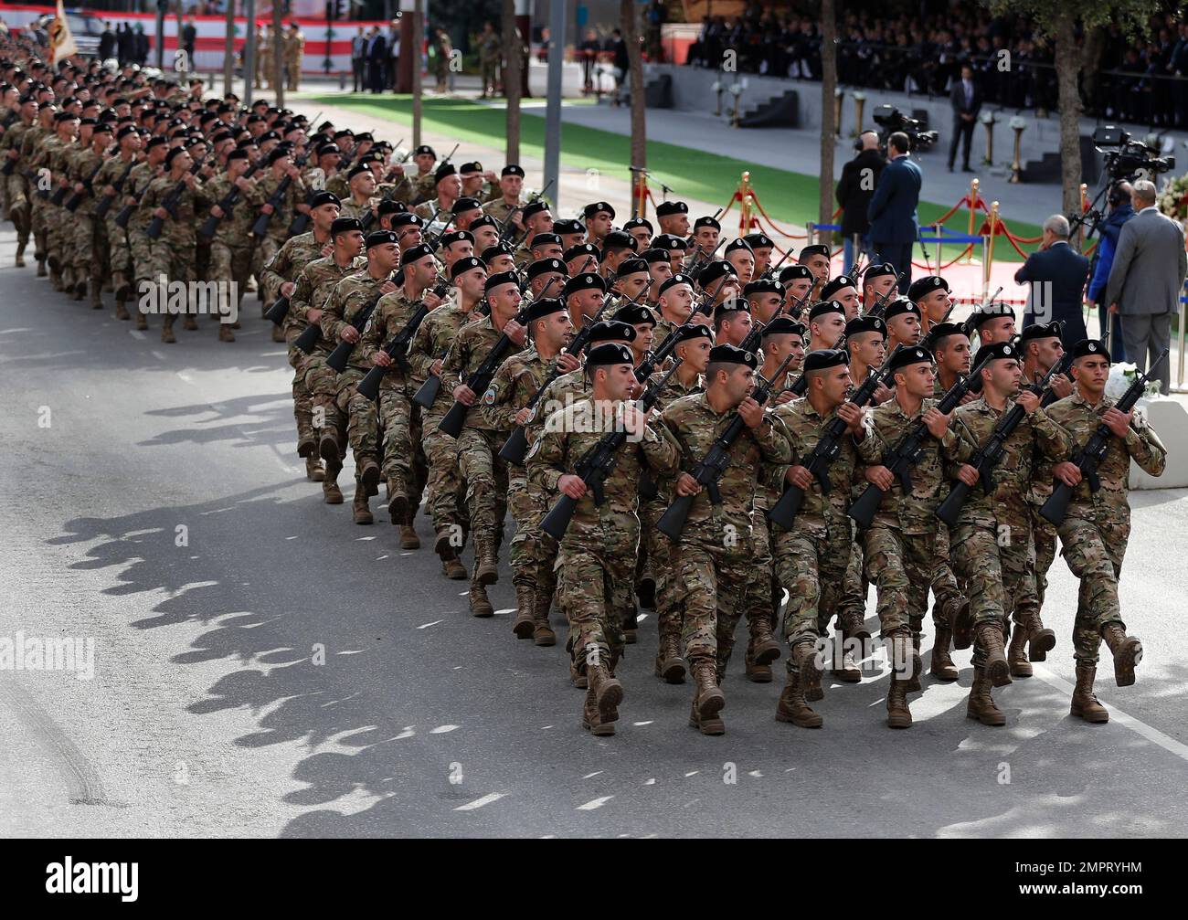 Lebanese army soldiers march during a military parade to mark the 74th ...