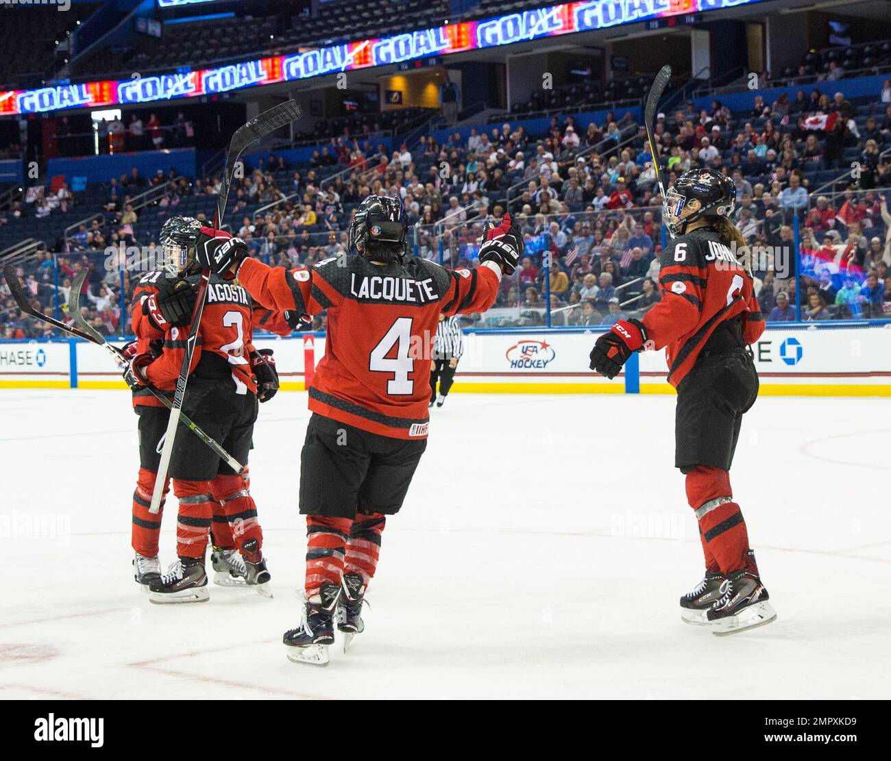Canada's Brigette Lacquette (4) celebrates with teammates Haley Irwin ...