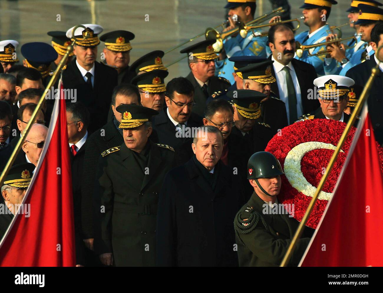 Turkey's President Recep Tayyip Erdogan, centre, attends a wreath-laying ceremony at the ...