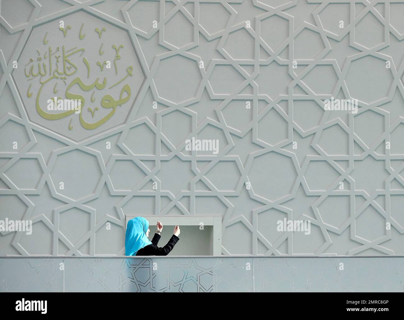 A woman stands in the new central DITIB mosque on the "Day of Open ...