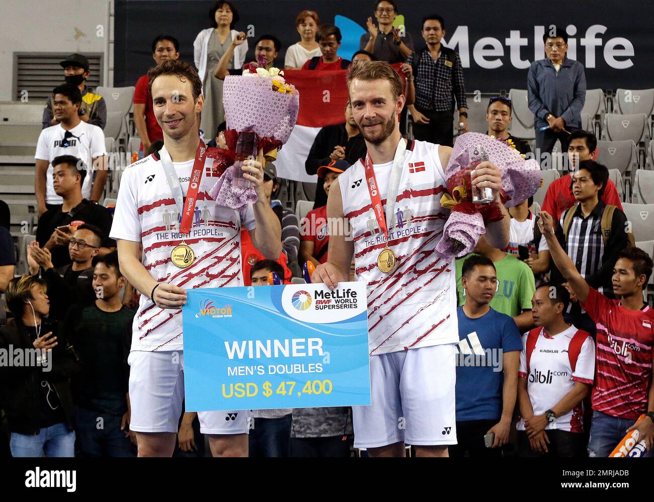 Denmark's Mathias Boe, left, and his teammate Carsten Mogensen pose ...