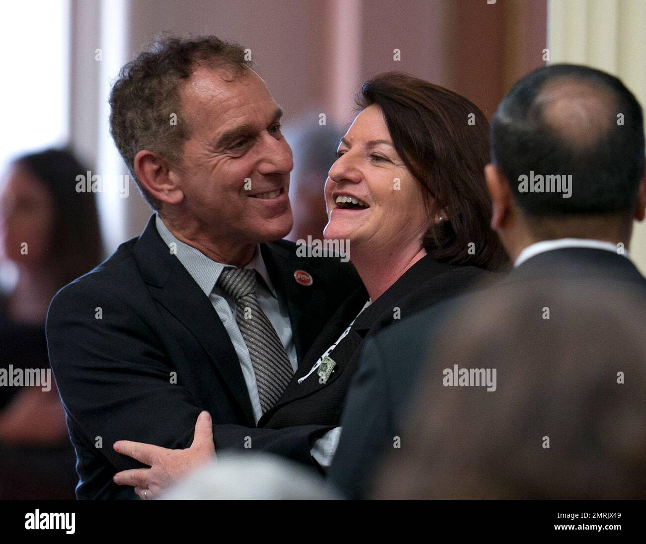 State Sen. Toni Atkins, D-San Diego, is congratulated by Sen. Bob ...