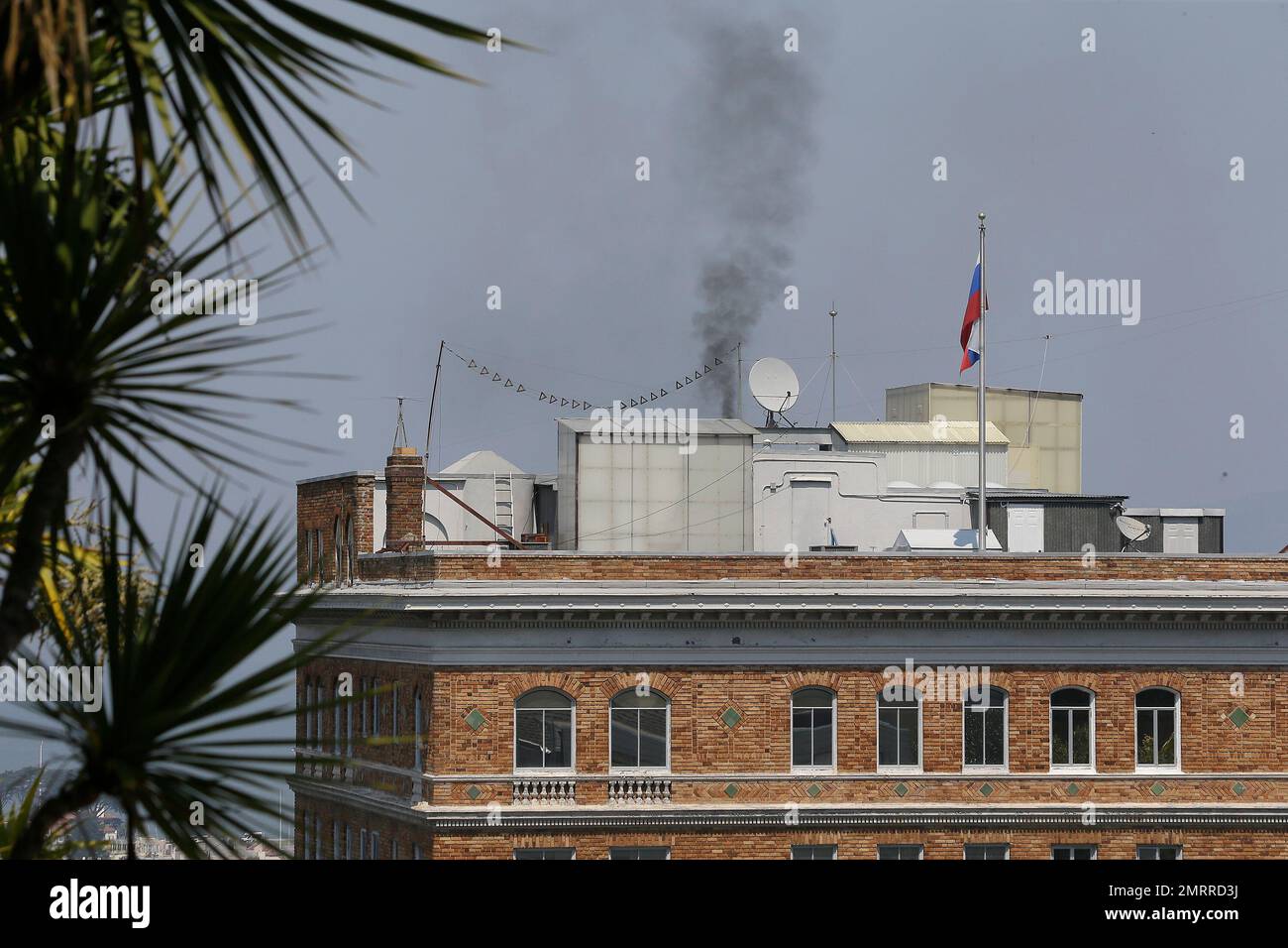 Black smoke rises from the roof at the Consulate-General of Russia ...