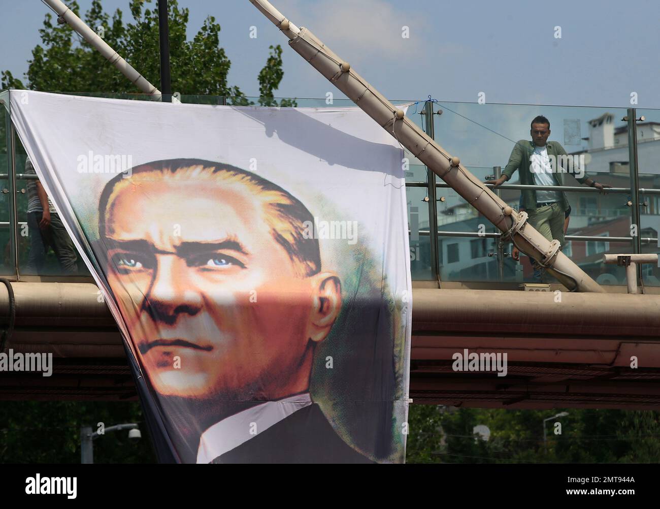 A poster of modern Turkey's founder Mustafa Kemal Ataturk decorates a ...