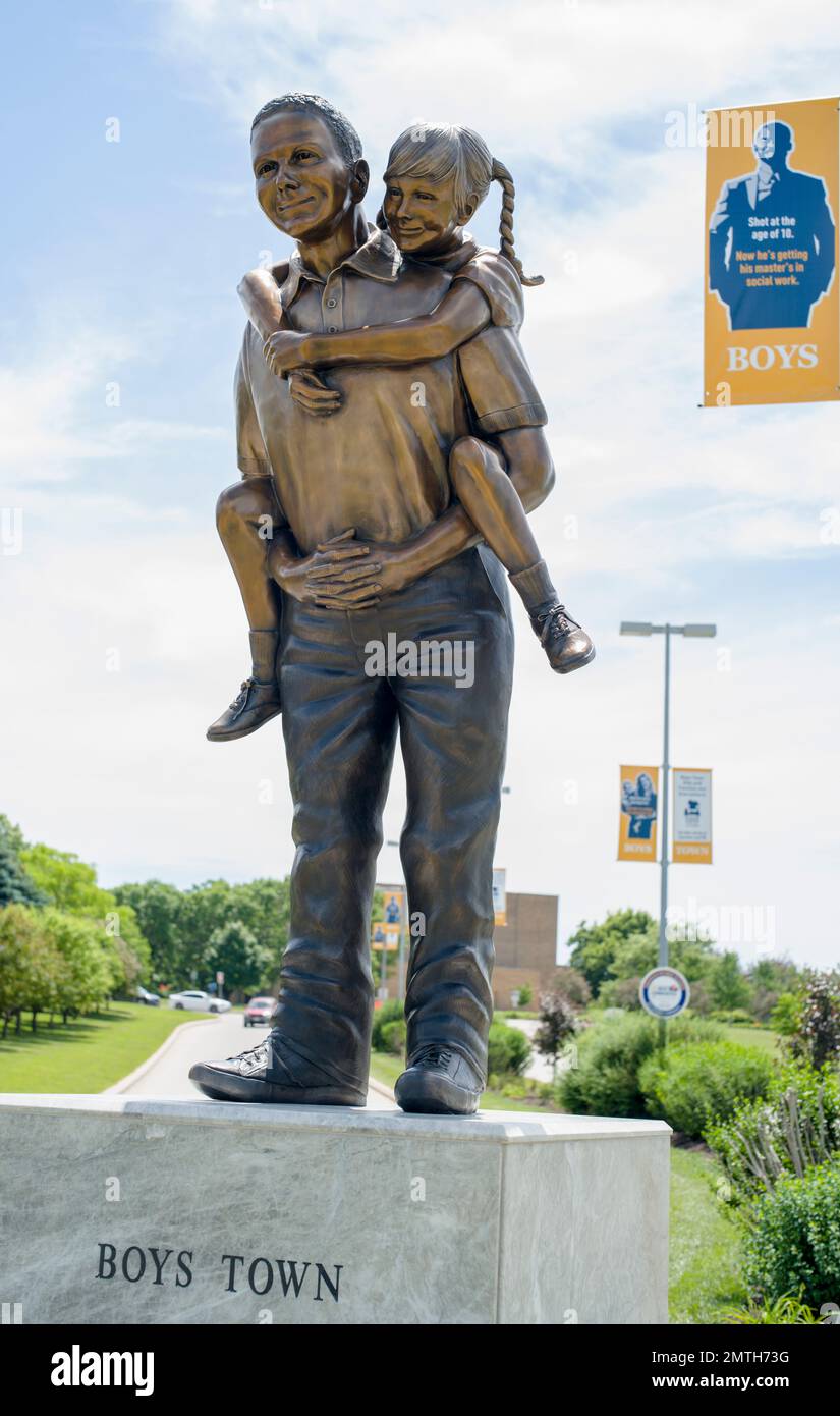 The new Boys Town statue at the entrance to Boys Town, Neb., depicts an ...