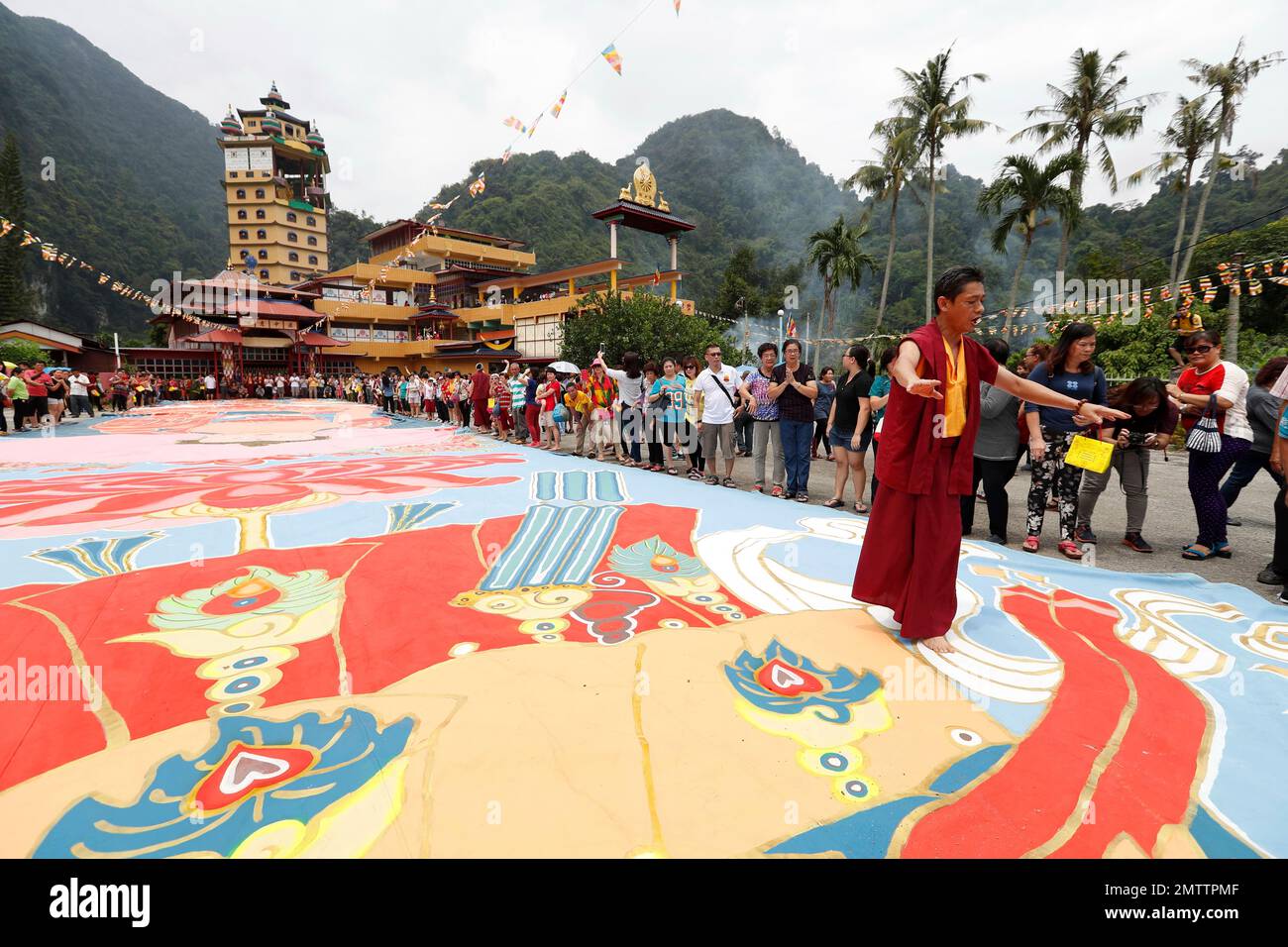 Devotees unveil a giant canvas of sacred "Thangka" measuring 60 meters ...