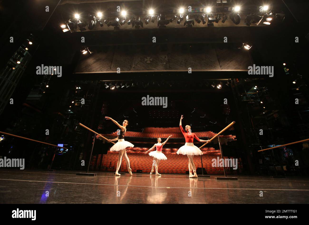 Dancers from The Australian Ballet warm up for morning rehearsals of ...