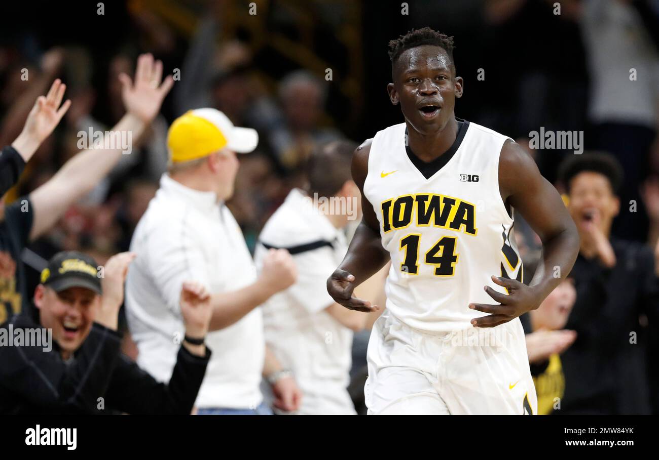 Iowa guard Peter Jok reacts after making a three-point basket during ...