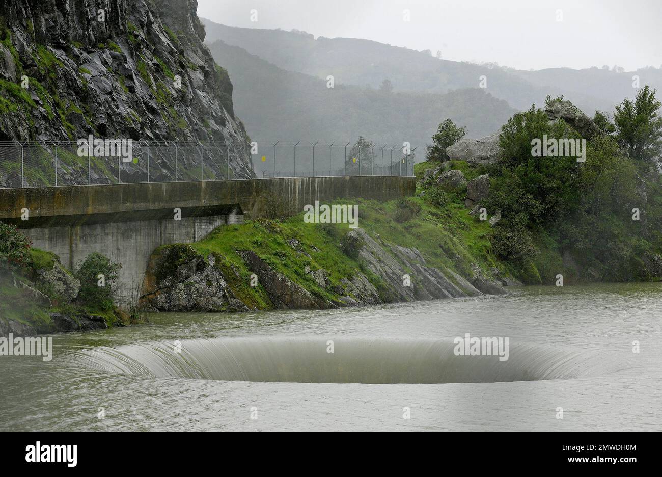 Water flows into the iconic Glory Hole spillway at Monticello Dam ...