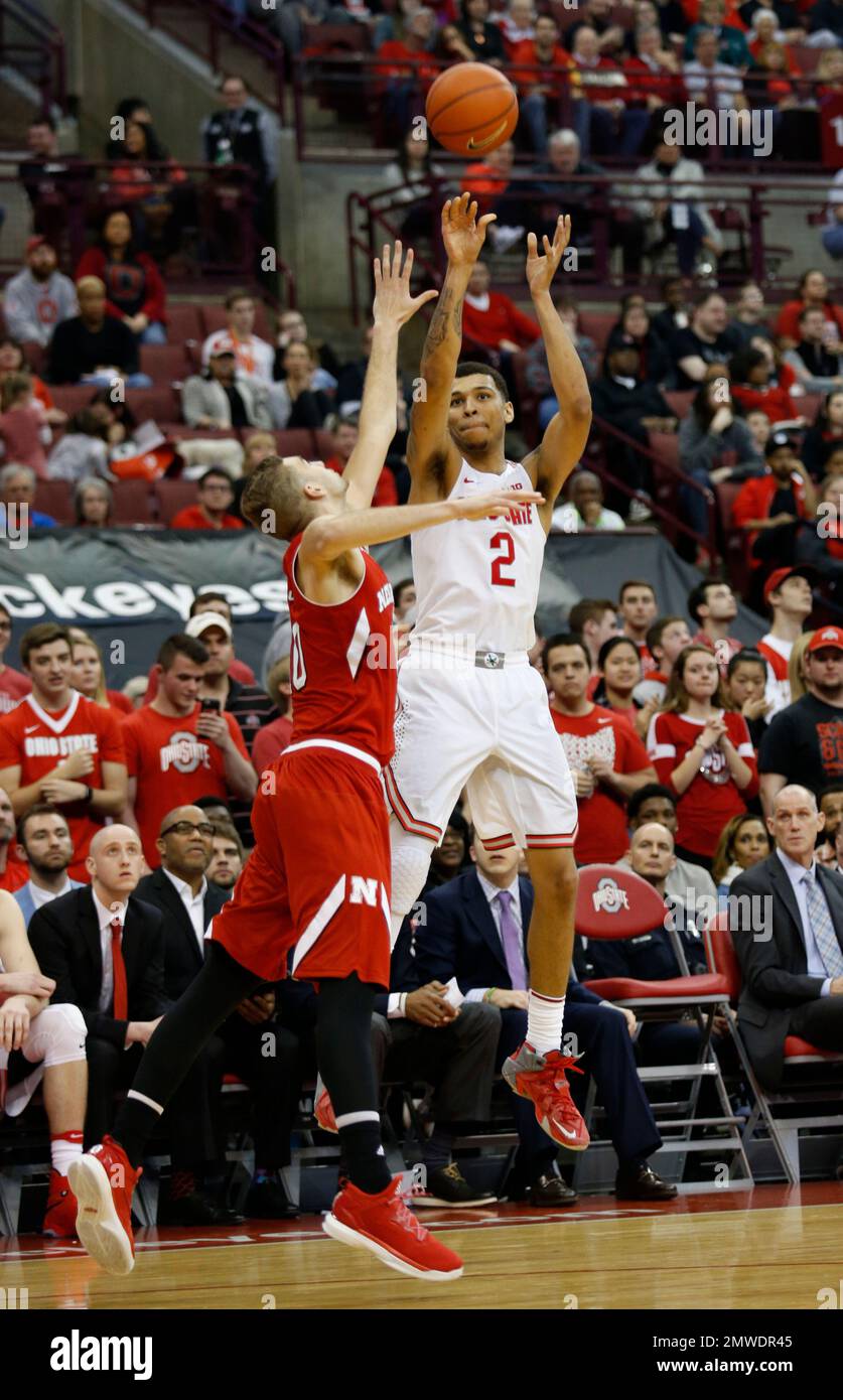 Ohio State forward Marc Loving, right, goes up for a shot against ...