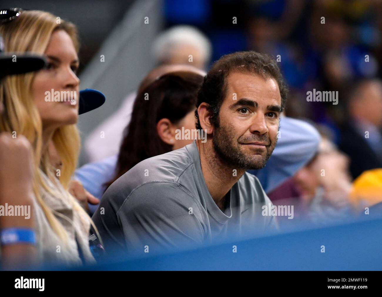Retired pro tennis player Pete Sampras watches the second half of an ...