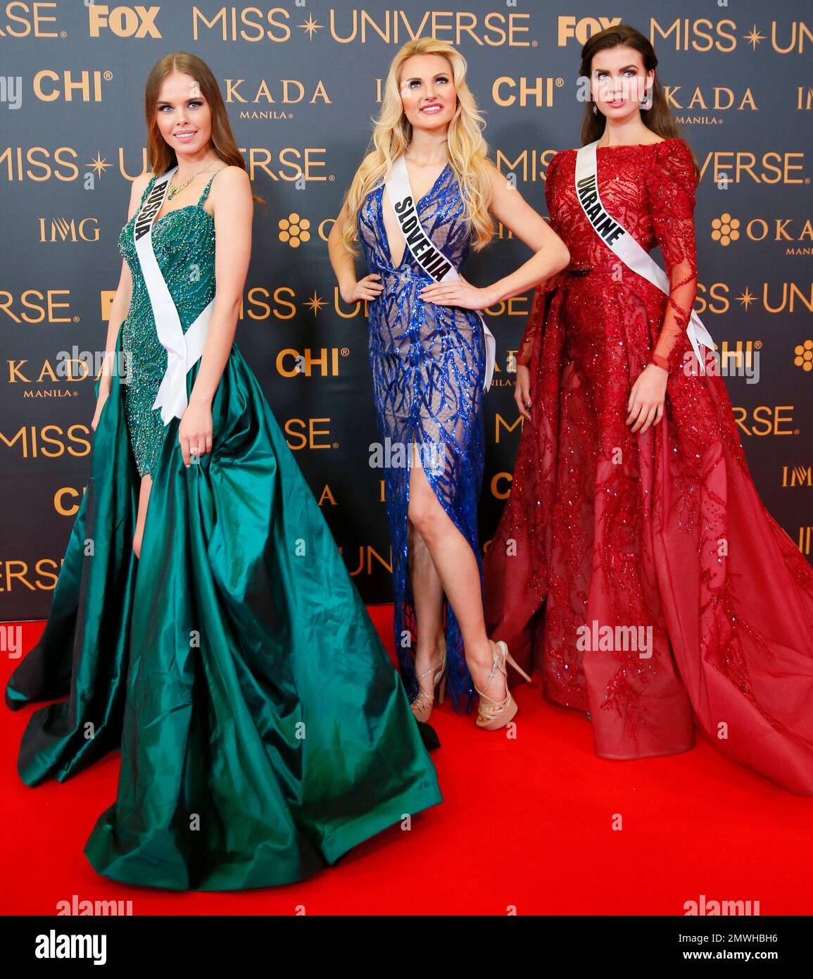 Miss Universe contestants pose on the red carpet on the eve of their ...