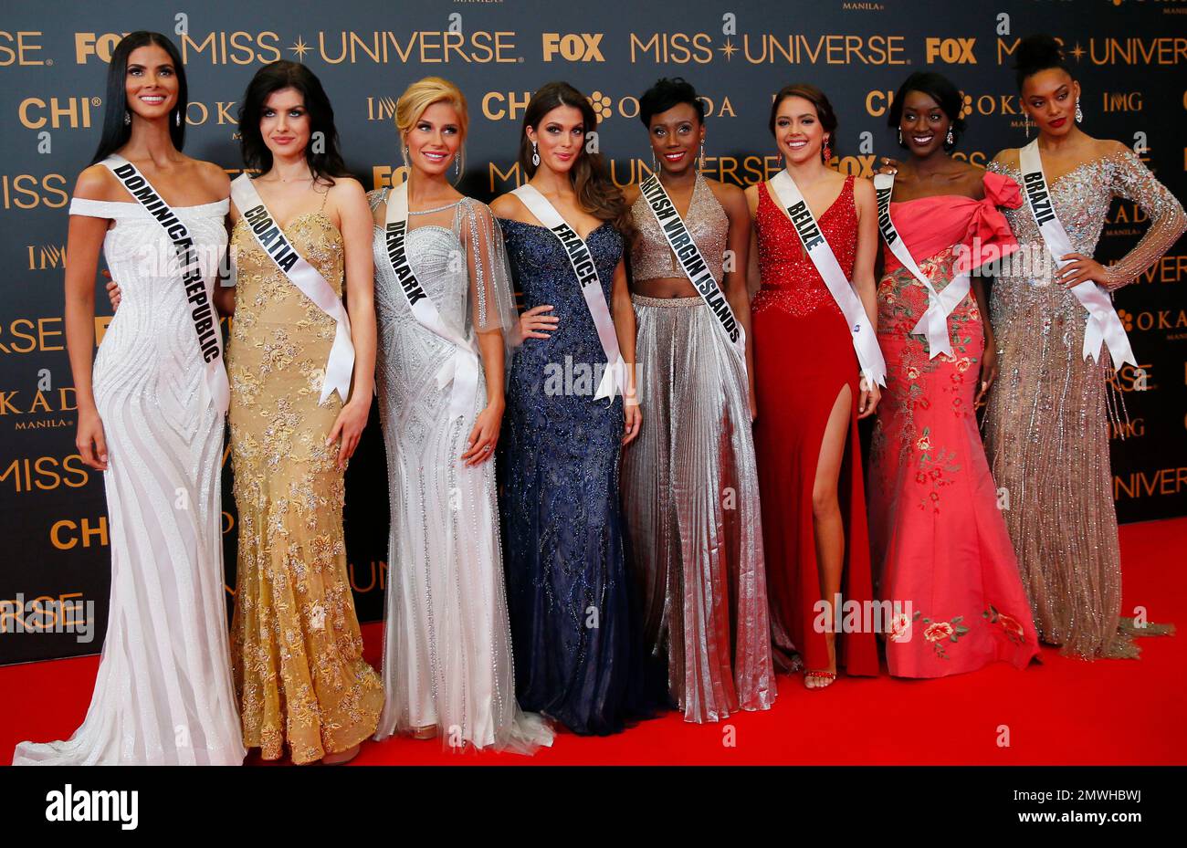 Miss Universe contestants pose on the red carpet on the eve of their ...