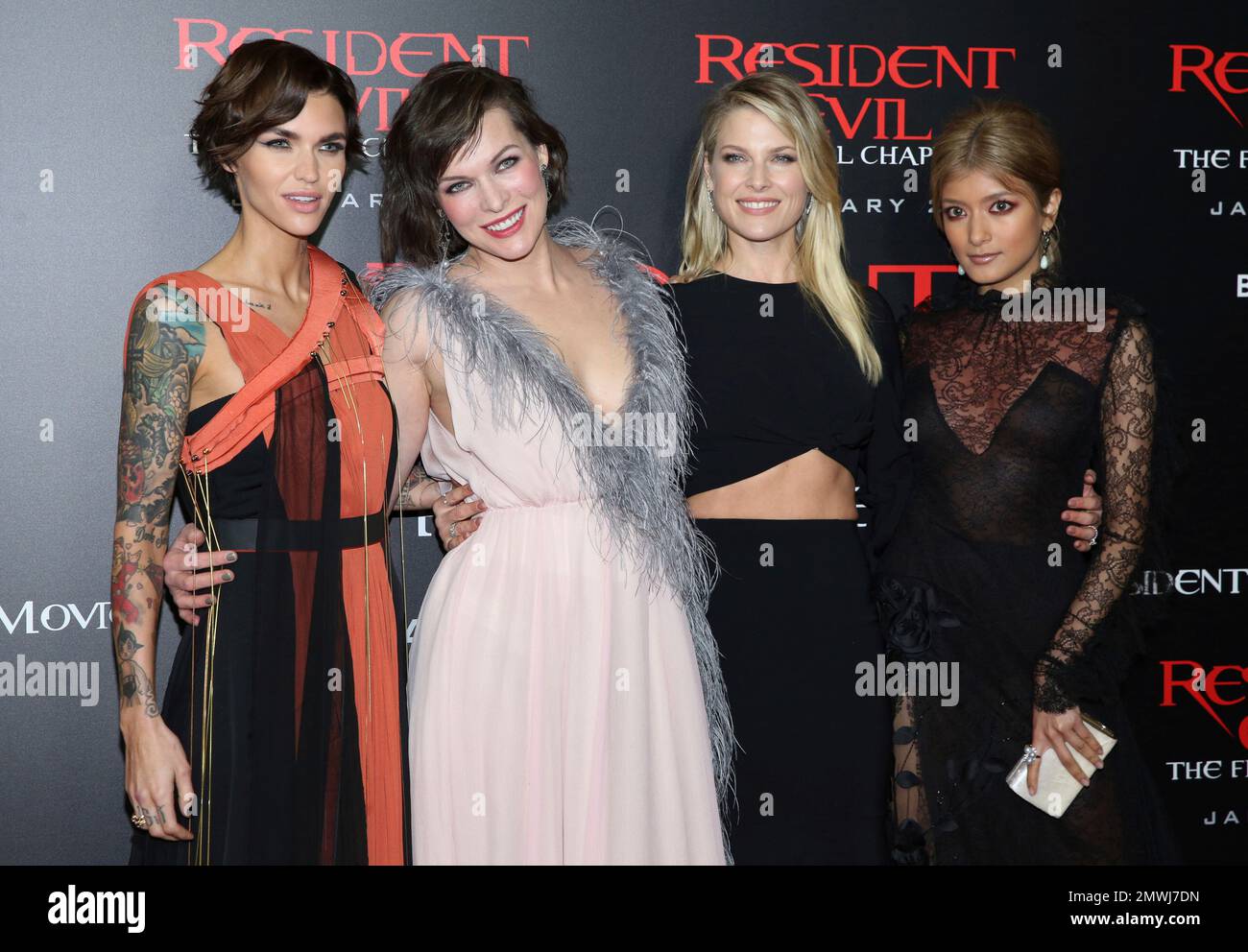 Ruby Rose, from left, Milla Jovovich, Ali Larter and Rola arrive at the ...
