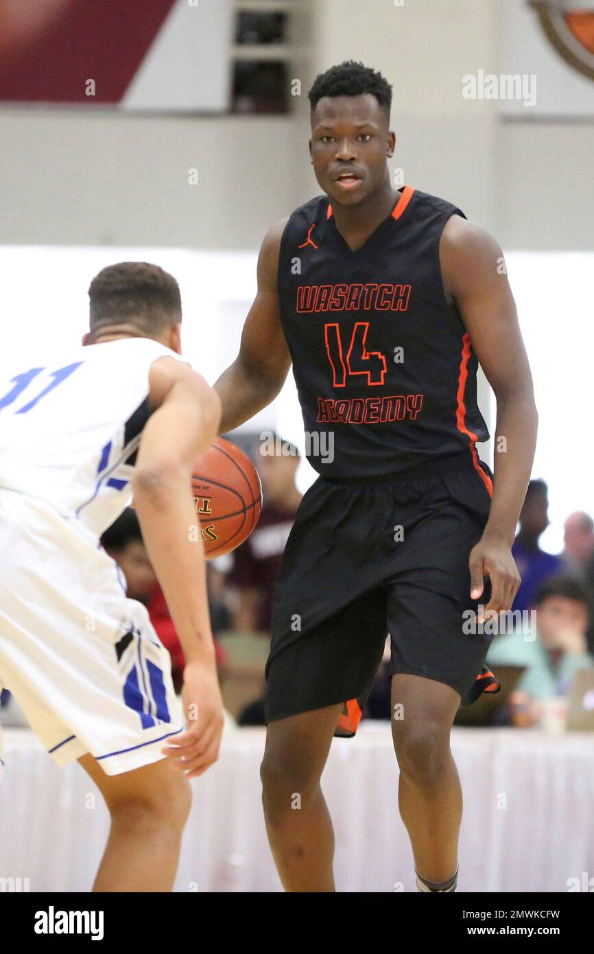 Wasatch Academy's Emmanuel Akot #14 in action against IMG Academy ...