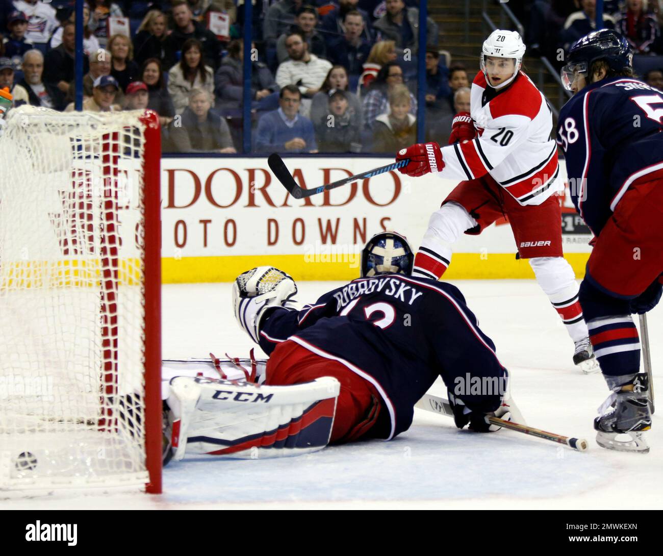 Carolina Hurricanes forward Sebastian Aho, center, of Finland, scores ...
