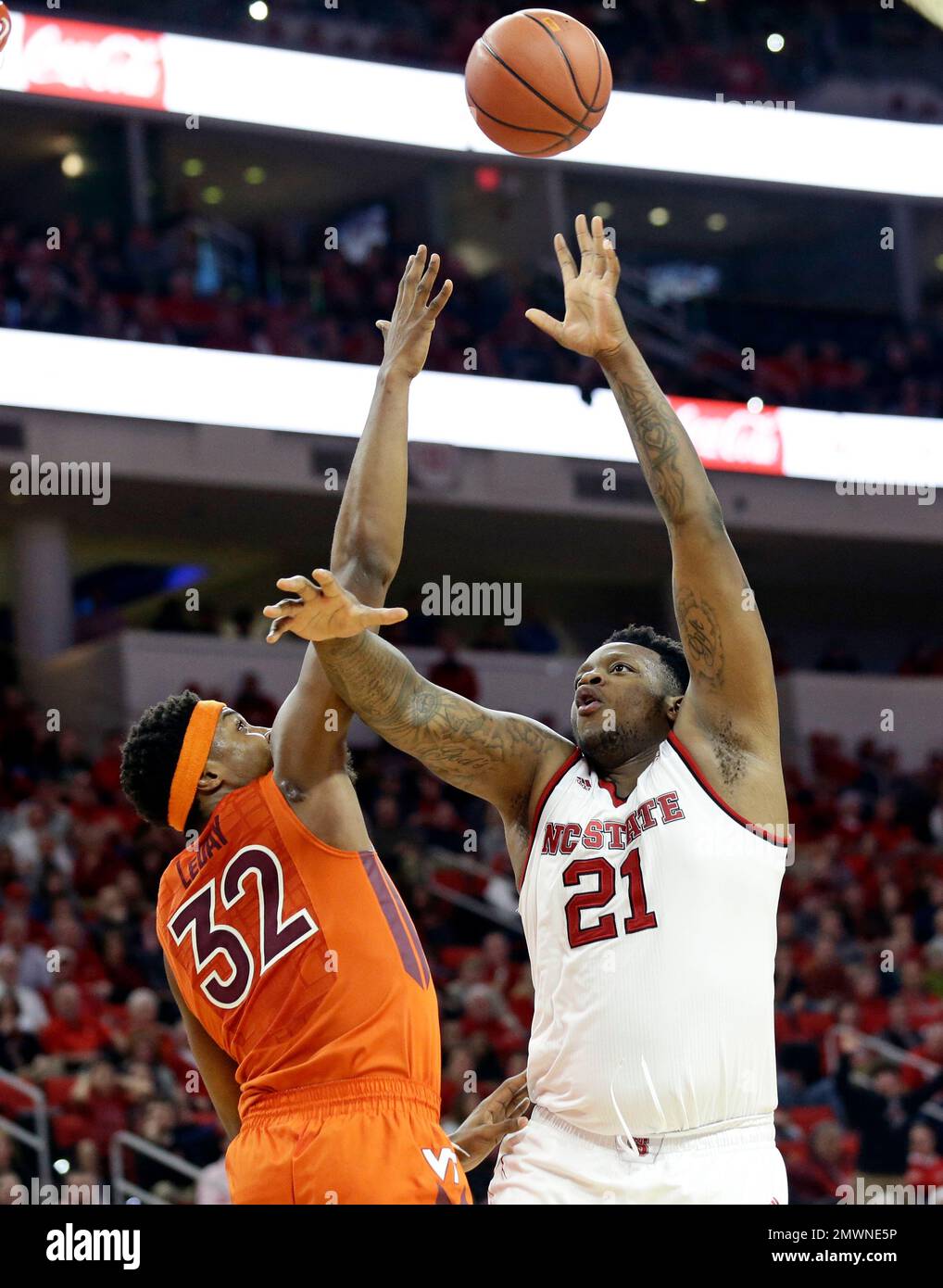 Virginia Tech's Zach LeDay (32) blocks while North Carolina State's ...