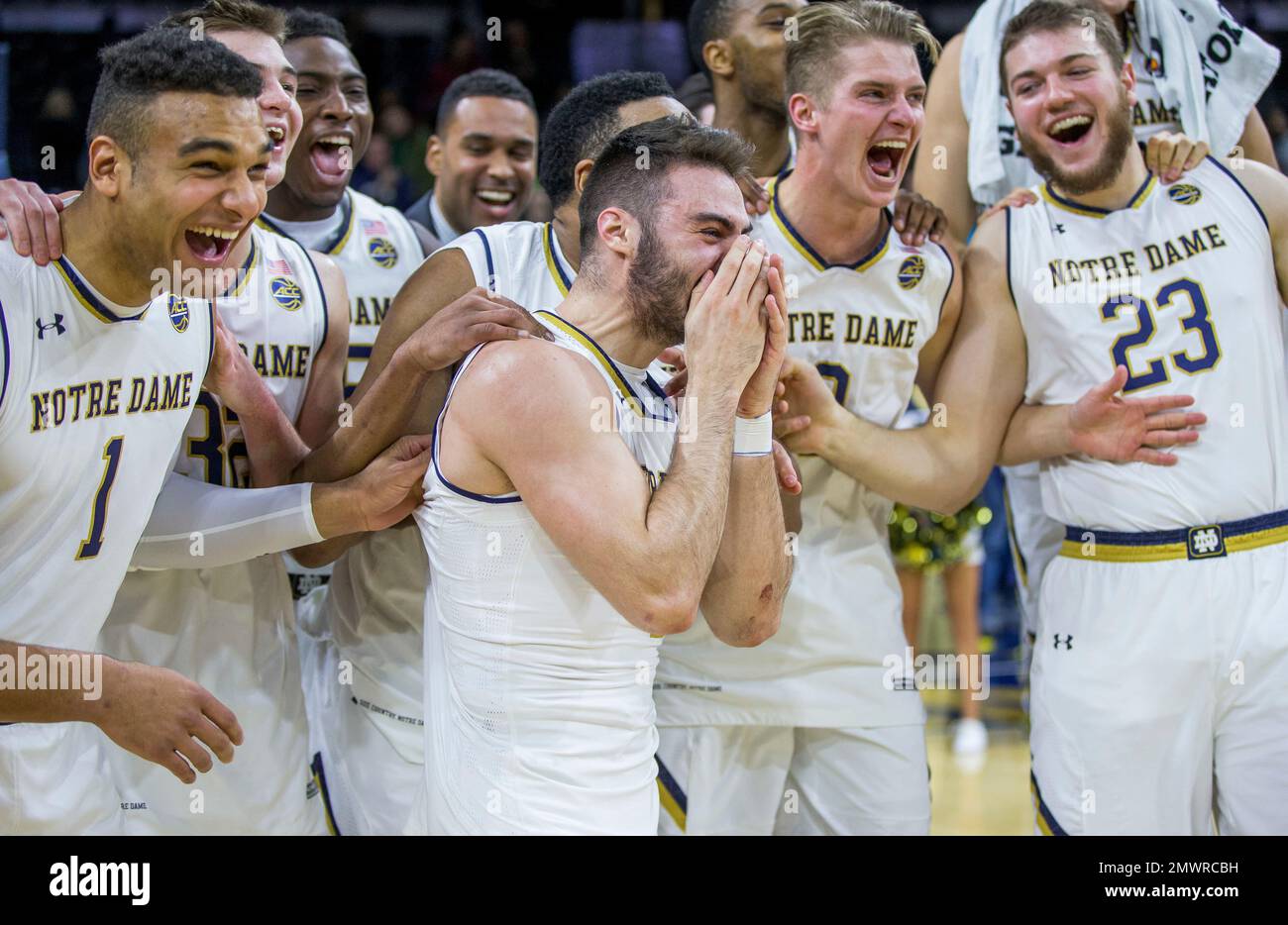 Notre Dame's Matt Farrell, center, is surrounded by teammates as he ...