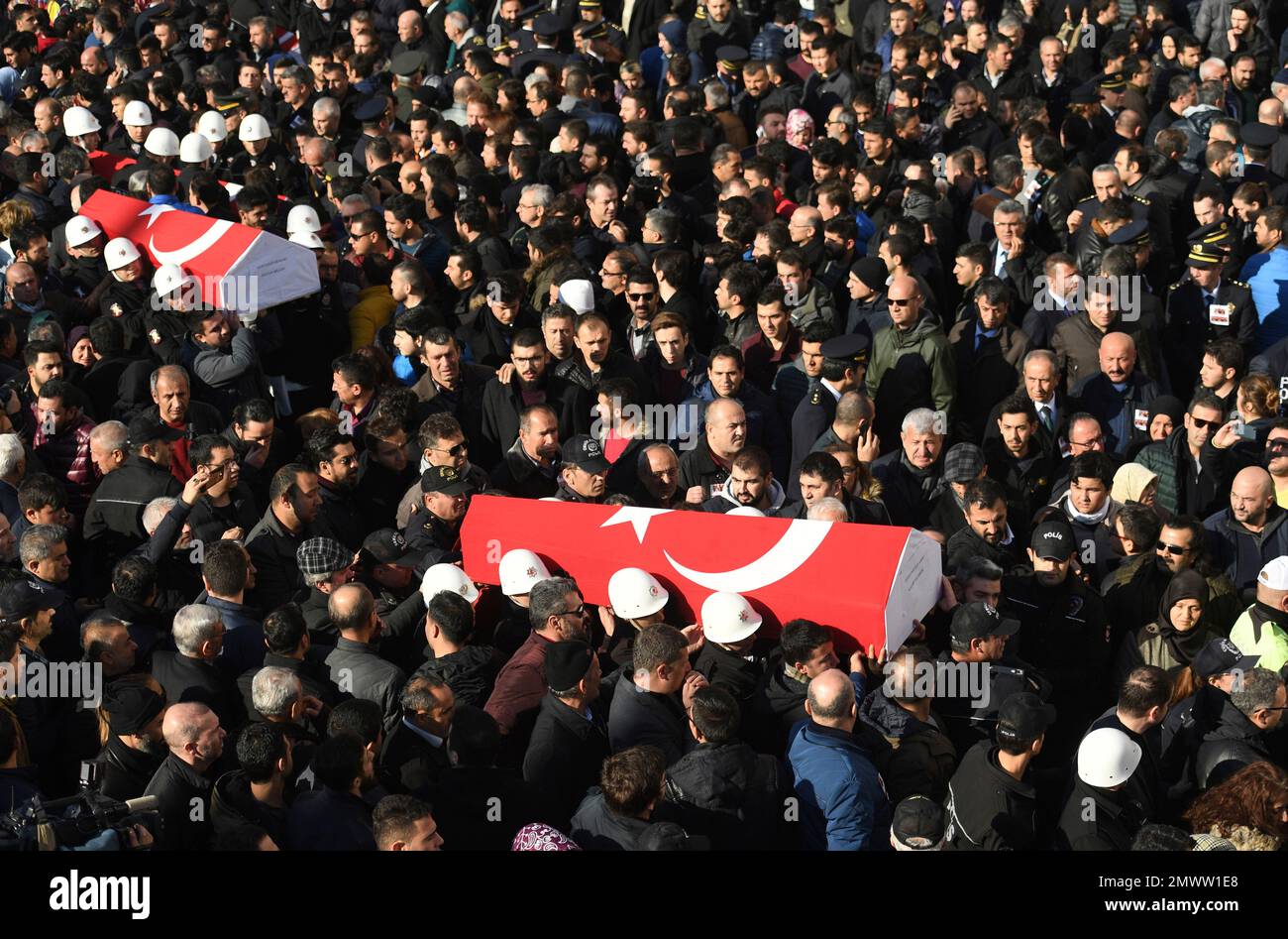 People gather to attend a memorial in Istanbul, Sunday, Dec. 11, 2016 ...