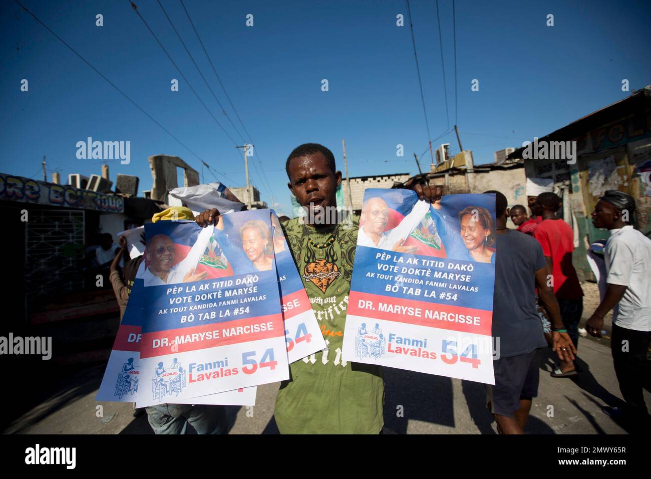 A supporter of presidential candidate Maryse Narcisse, from Fanmi ...