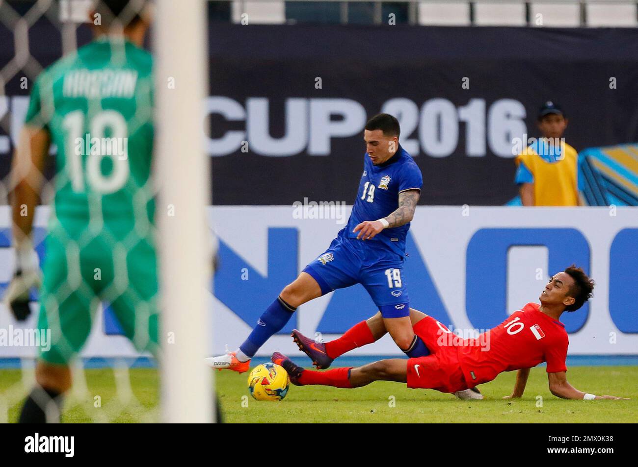 Singapore's Muhammad Faris Ramli (10) clears the ball away from Tristan ...